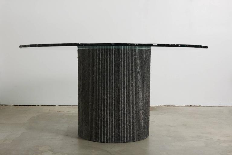 Round Dining Table with Chipped Glass Top and Cylindrical Granite Base ...