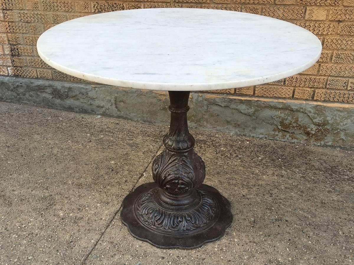 Marble Dining Table with Ornate Cast Iron Base at 1stdibs