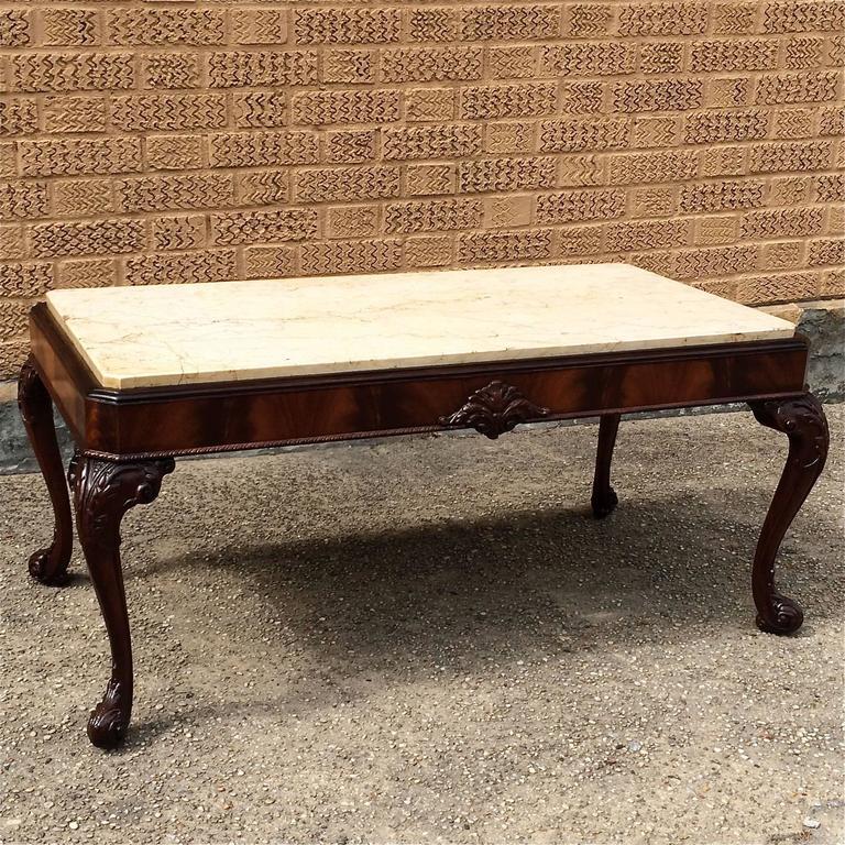 Antique Carved Flame Mahogany And Marble Coffee Table at 1stdibs