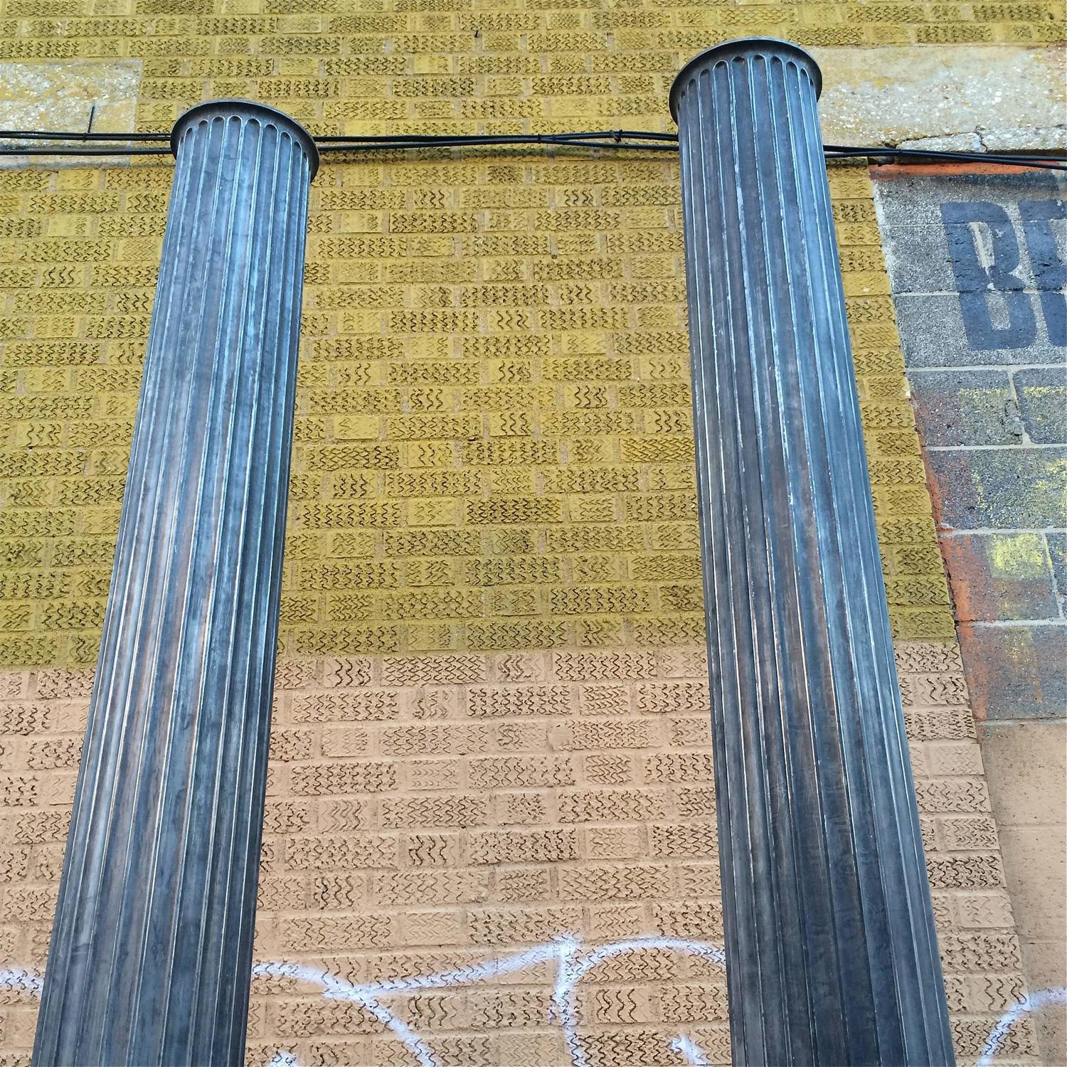 Pair of Architectural Gunmetal Steel Fluted Columns For Sale at 1stdibs