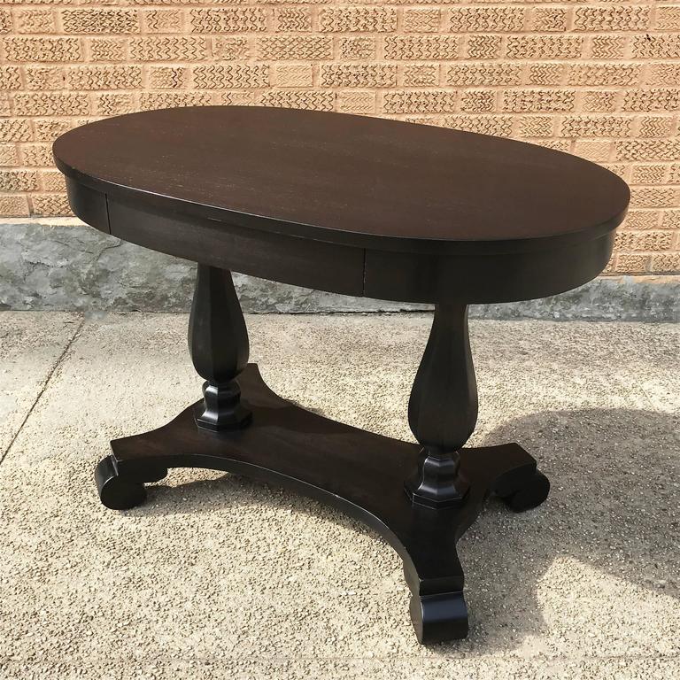 Empire Ebonized Mahogany Oval Center Table at 1stDibs