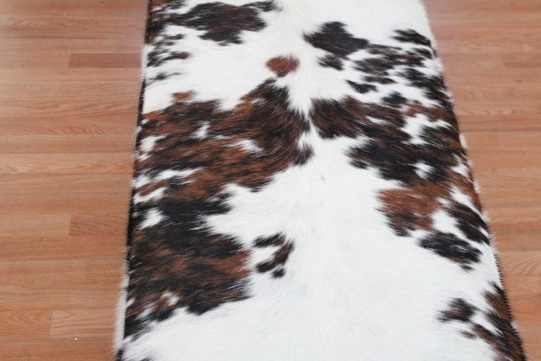 Chrome and Cowhide Covered Bench at 1stDibs