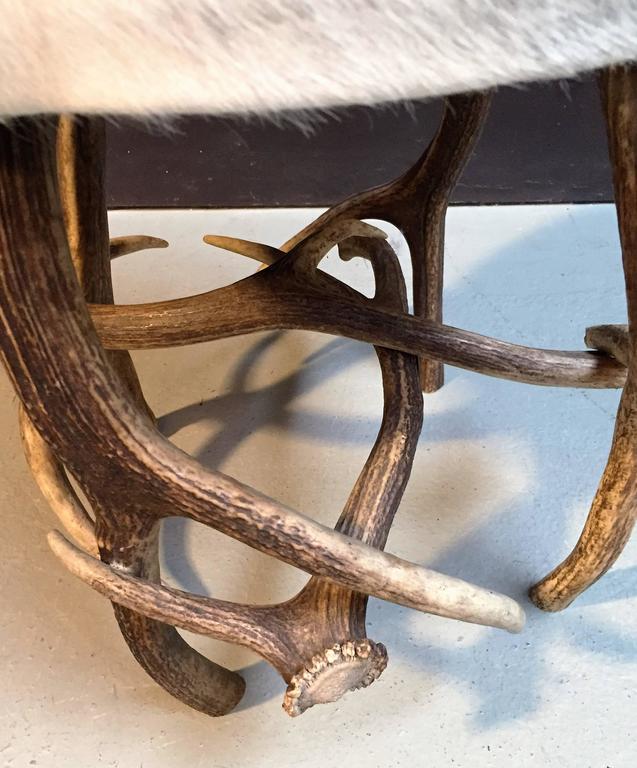 Antler stool with grey cowhide at 1stDibs