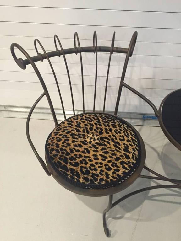 Tea Table with Two Chairs Having Leopard Print Cushions and Marble Top ...