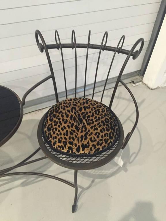 Tea Table with Two Chairs Having Leopard Print Cushions and Marble Top ...