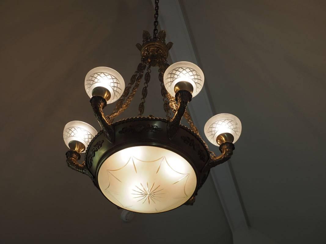 Pair of Massive and Elaborate Theatrical Bronze Chandeliers at 1stDibs