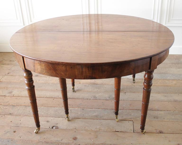 Early 19th Century Dining or Entry Table with eight Legs and Caster ...