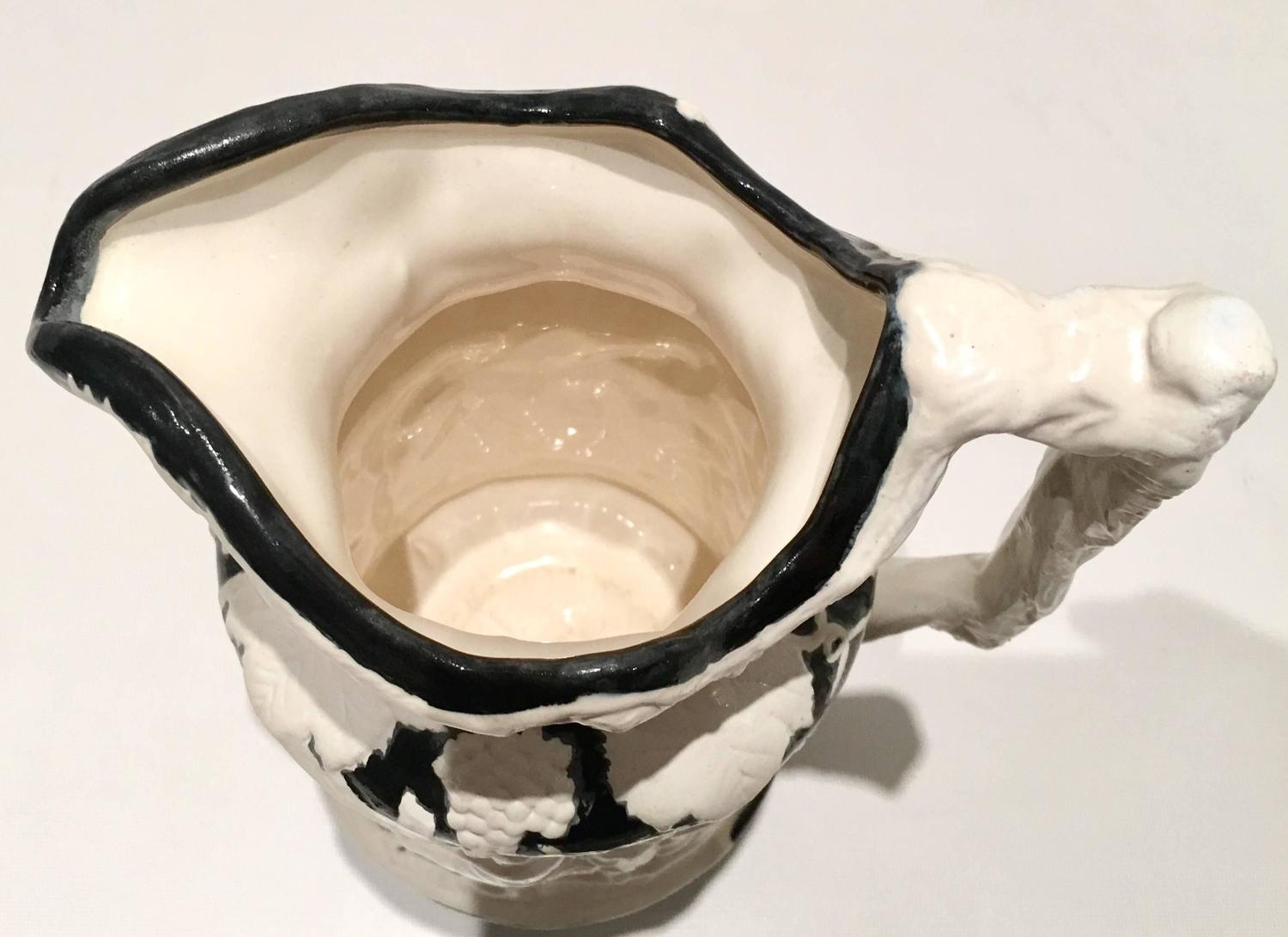 Vintage Raised Relief Pottery Pitcher Faux Bois Handle For Sale at 1stdibs