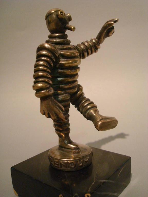 Michelin 1910 Slim-Skinny Bibendum Bronze Car Mascot Hood Ornament at ...