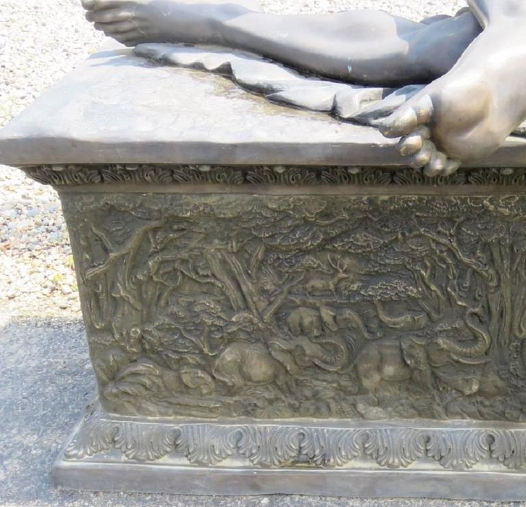 Six-Foot Bronze Statue of a Reclining Roman God For Sale at 1stDibs