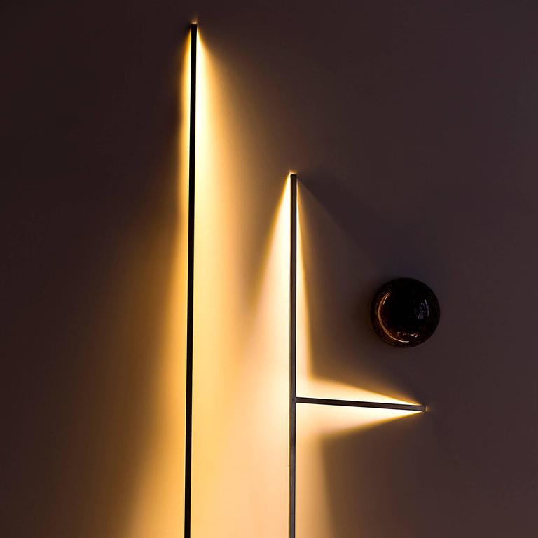Falling Star Led Wall Lamp in Brass with a Black Marble Base at 1stDibs