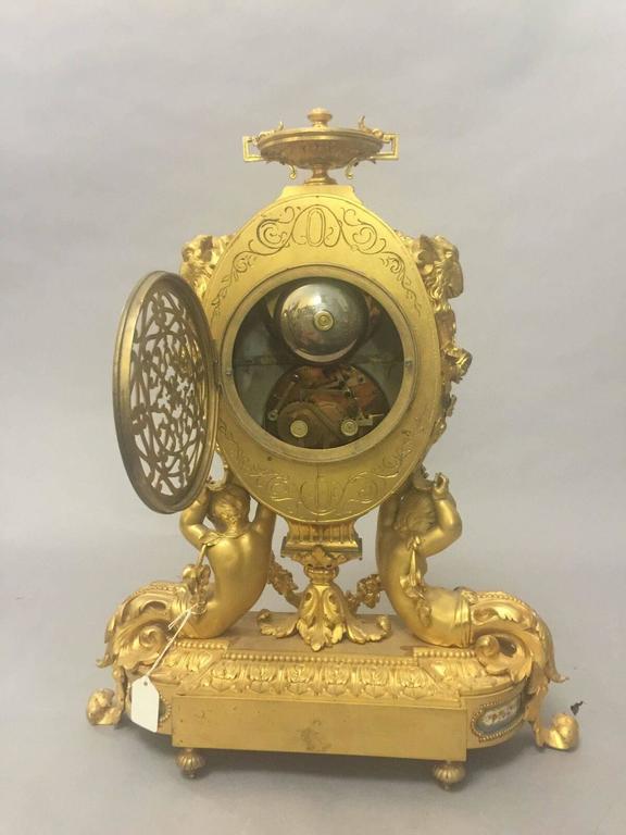 Charles Oudin Clock and Garniture at 1stDibs