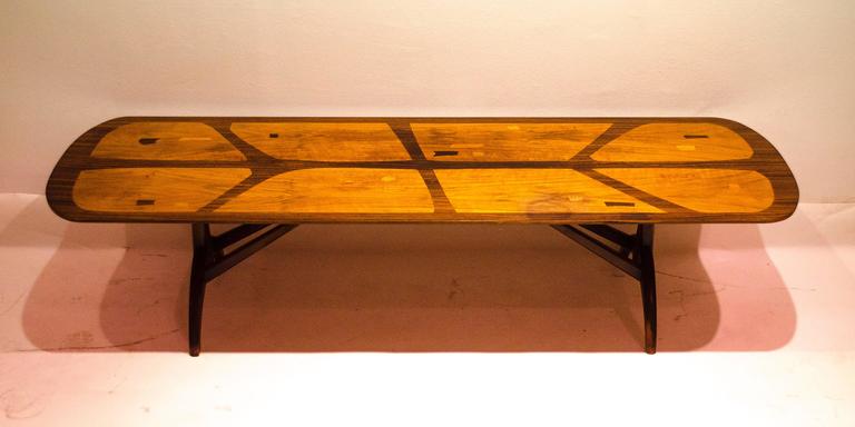 Heals. A Single Mid-Century 'Long Tom' Coffee Table with various inlaid ...