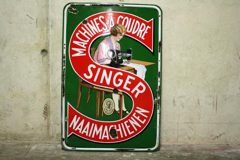 Enamel Sign Singer Sewing Machines, 1938 at 1stDibs
