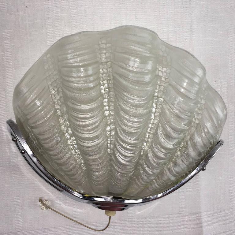 Pair of French Art Deco Sconces with Stylized Shell Design at 1stDibs
