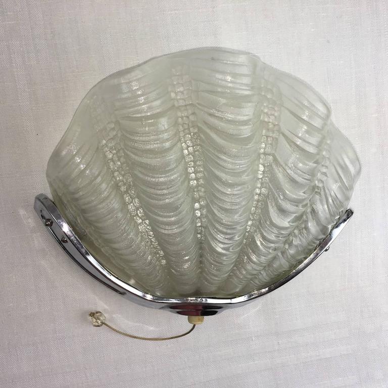 Pair of French Art Deco Sconces with Stylized Shell Design at 1stDibs