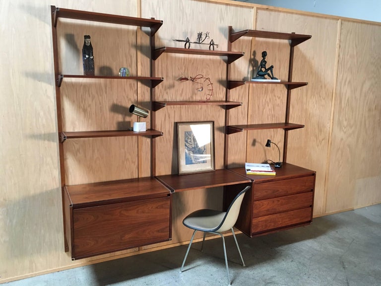 Barzilay Three-Bay Floating Wall Unit in Walnut at 1stDibs