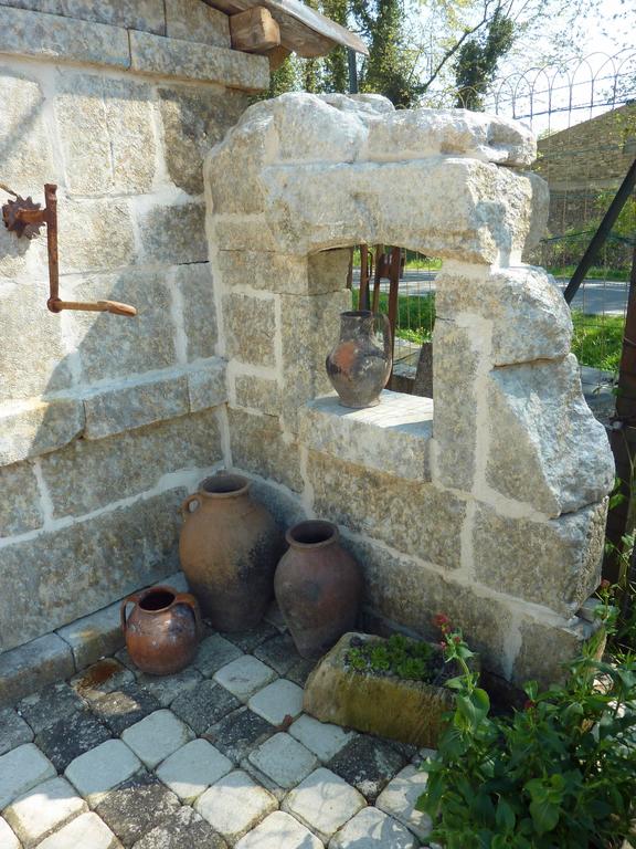 Superb 19th Century French Limestone Well with Tiled Roof and Side-Wall ...