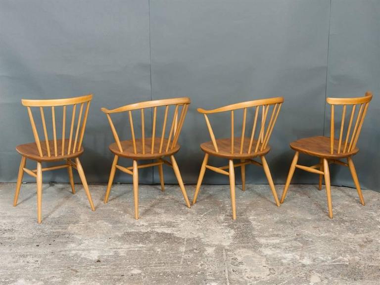 Two Ercol Cowhorn Armchairs, Two Spindle Back Chairs at 1stDibs