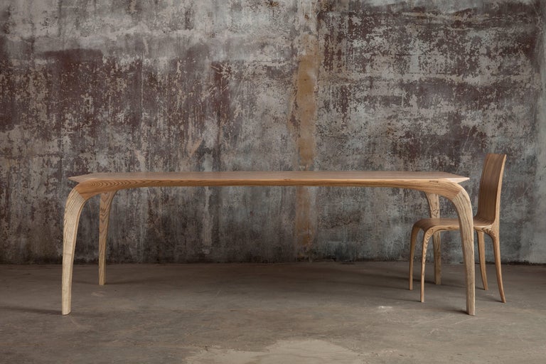Award winning rippled, ash hand-carved chairs. by Jonathan Field at 1stDibs