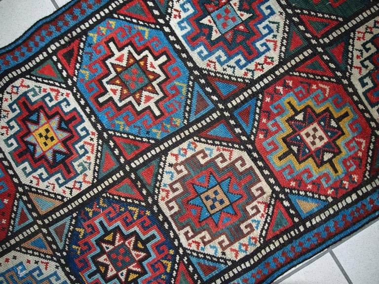 Handmade Antique Caucasian Kazak Runner, 1920s at 1stdibs