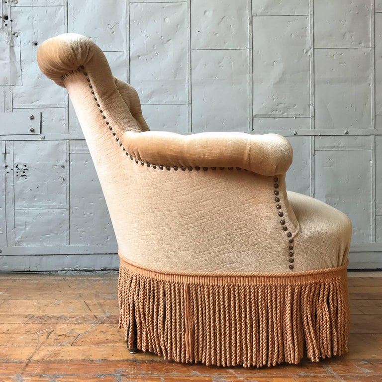 Pair of Tufted French Armchairs with Fringe at 1stDibs