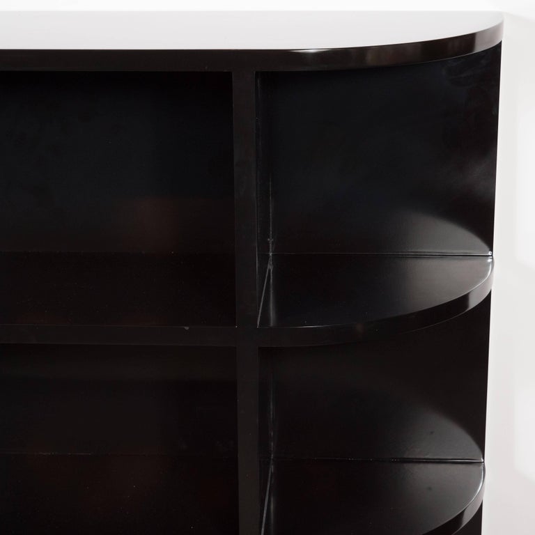 Art Deco Streamlined Machine Age Black Lacquer "Bullet" Bookcase at 1stDibs