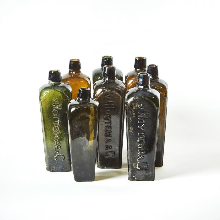 Set of 8 Multi-Color Gin Glass Bottles from Mid-Century Germany at 1stDibs