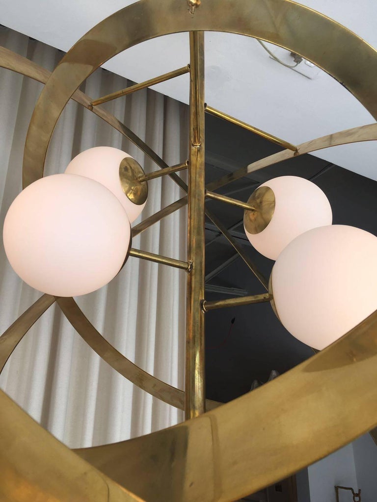 Saturn's Rings Chandelier in Brass and Frosted Globes at 1stDibs