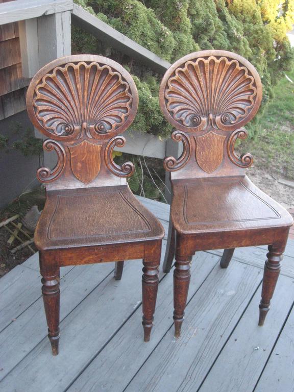 Pair of 19th Century English Oak Shell Back Hall Chairs at 1stDibs