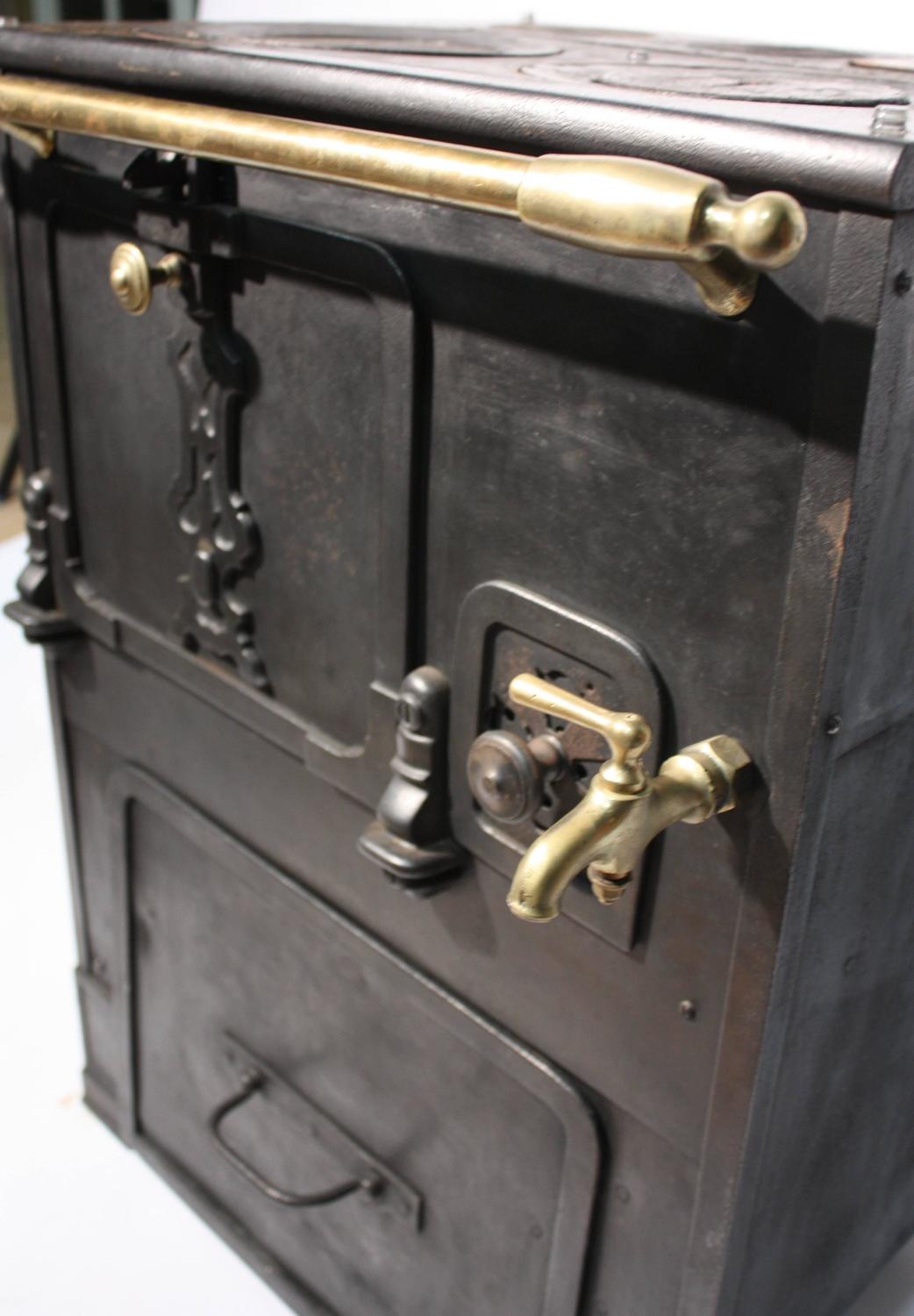 19th Century Small Cast Iron Stove at 1stdibs