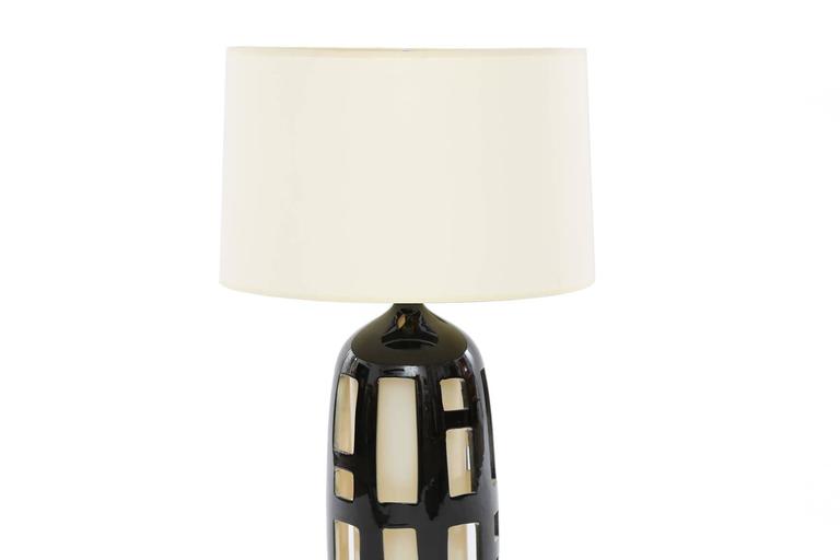 Striking Pair of Cut-Out Ceramic Lamps at 1stDibs