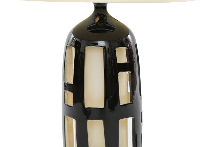 Striking Pair of Cut-Out Ceramic Lamps at 1stDibs