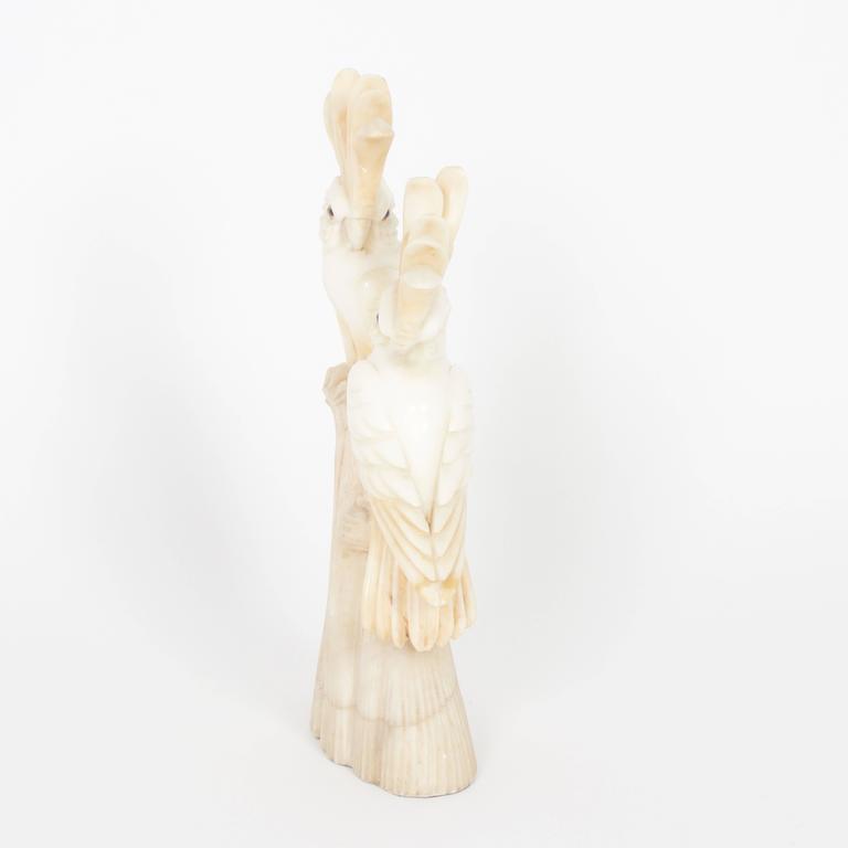 Two Spirited Carved Alabaster Cockatoos Perched on a Branch at 1stDibs