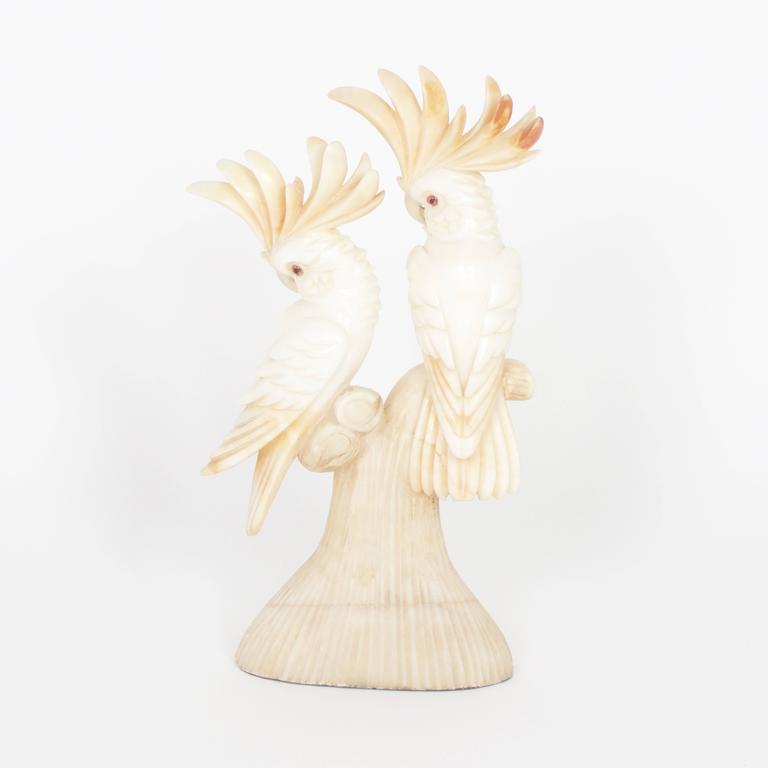 Two Spirited Carved Alabaster Cockatoos Perched on a Branch at 1stDibs