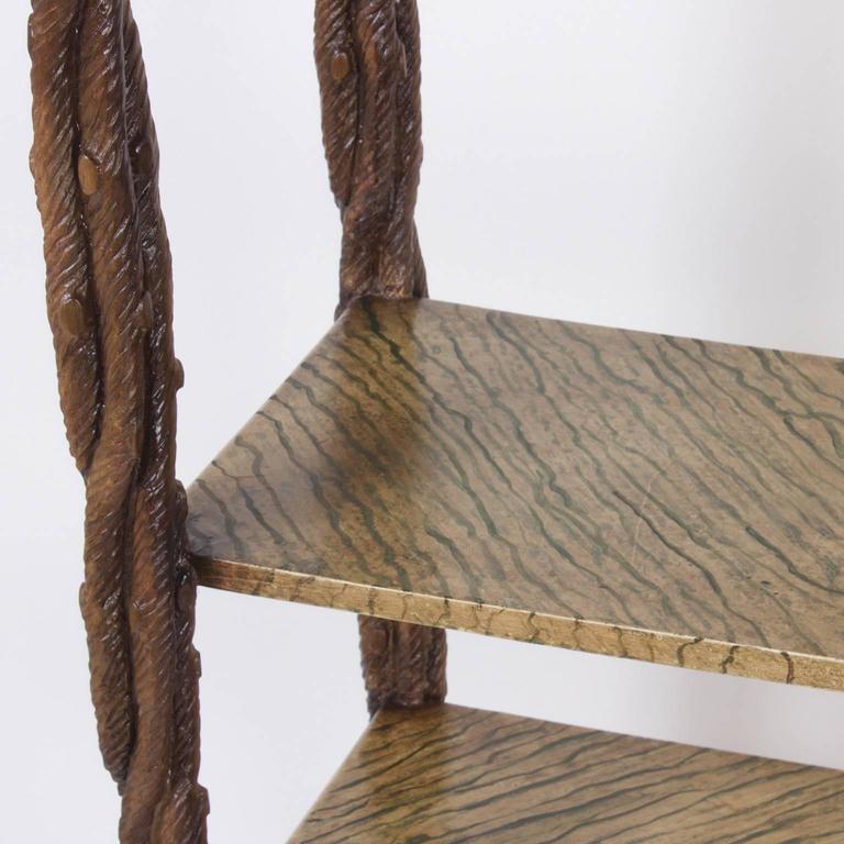 Mid-Century Modern Carved Wood Etagere with Palm Leaf Finials at 1stDibs