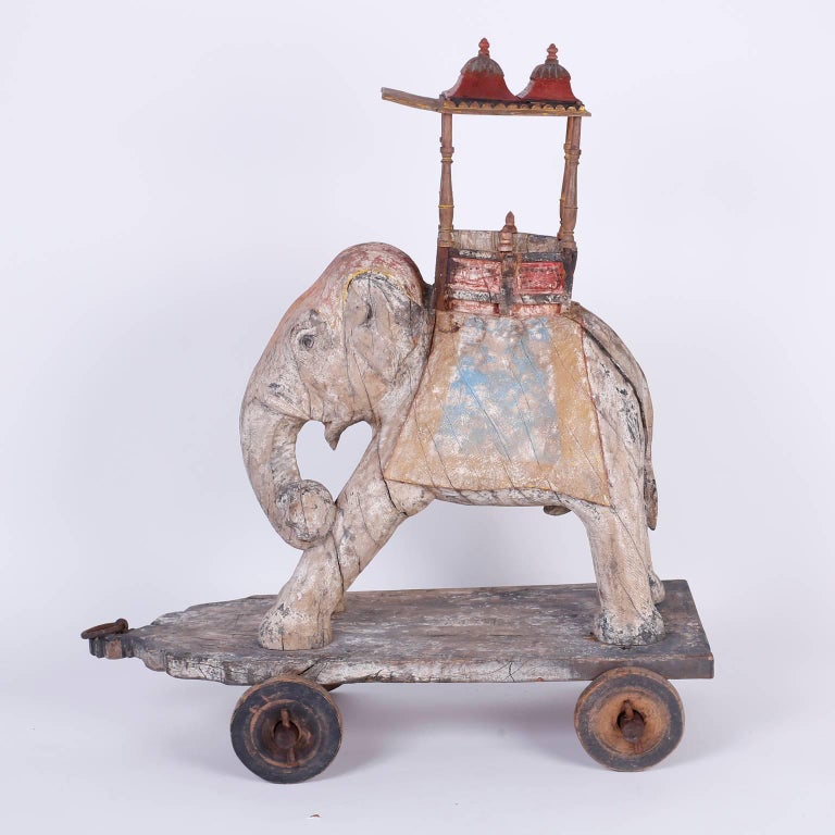 Large Anglo-Indian Carved Wood Elephant on Wheels at 1stDibs