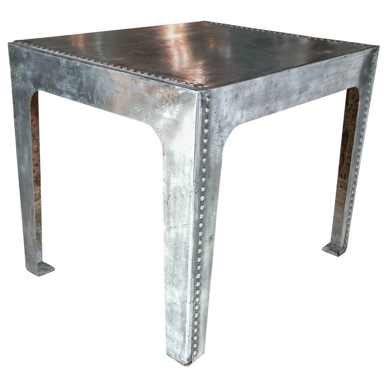 English Polished Steel Studded Water Tank Table For Sale at 1stDibs