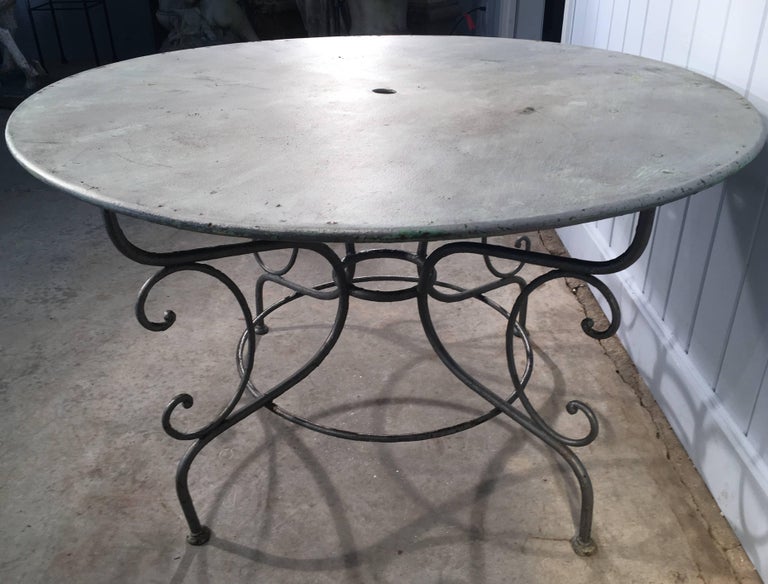 French Wrought Iron Round Dining Table with Scrolled Base at 1stDibs