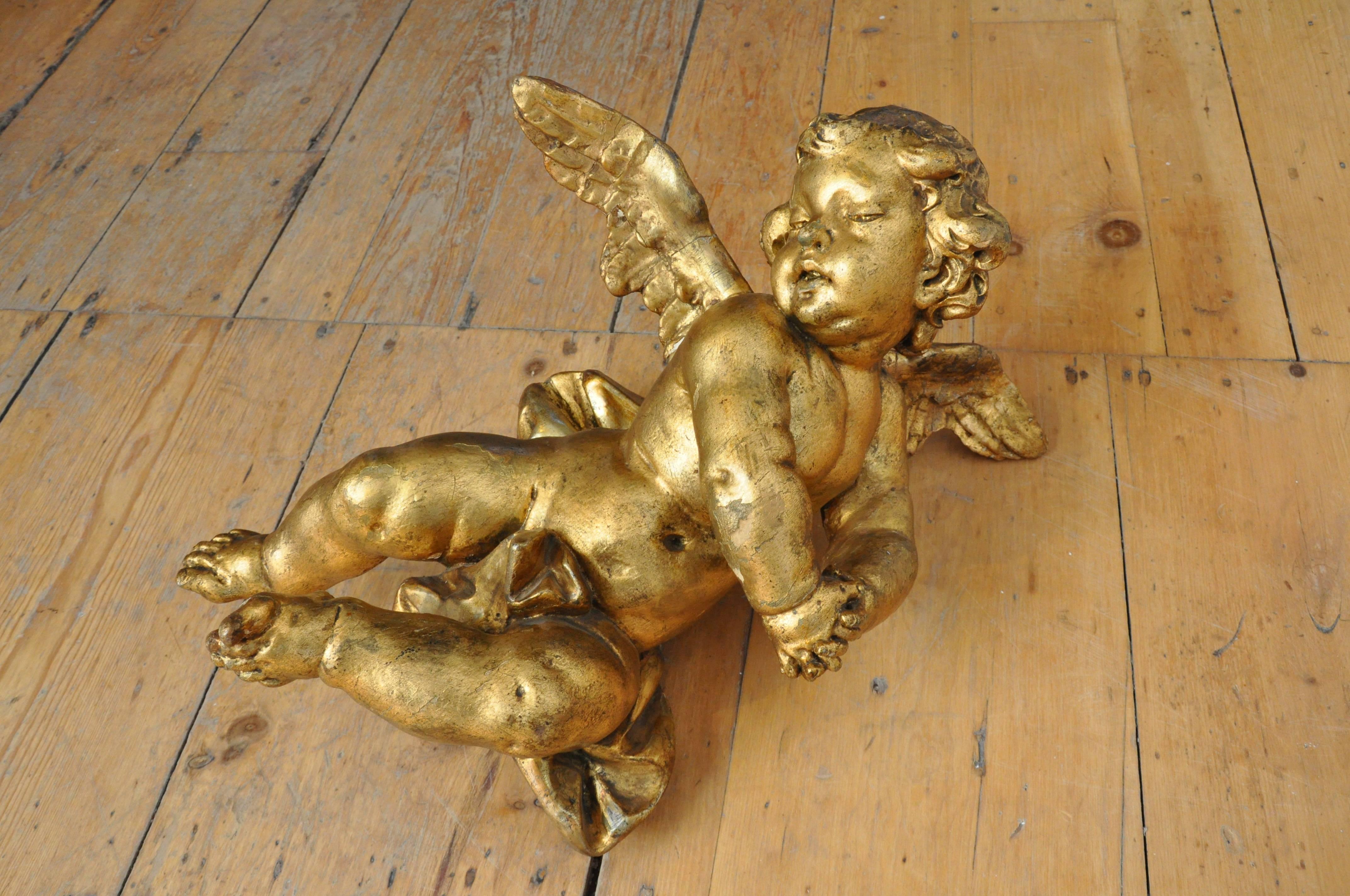 Pair of Italian Baroque Carved and Giltwood Cupids at 1stDibs