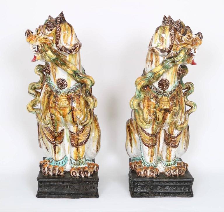 Pair of Hollywood Regency Italian Majolica Foo Dogs at 1stDibs