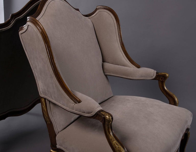 Pair of French Walnut Wing Chairs with Gilt Detailing at 1stDibs