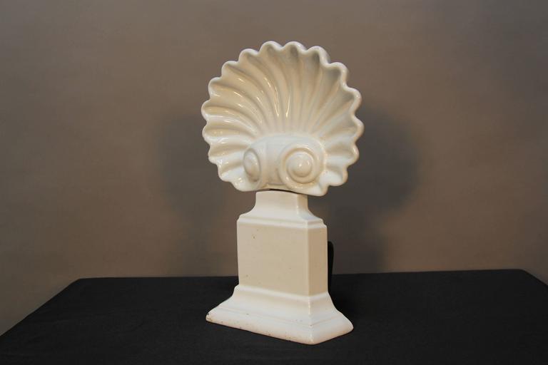 Pair of Enameled Shell Andirons For Sale at 1stDibs