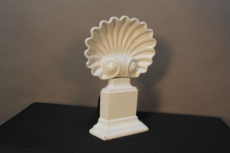 Pair of Enameled Shell Andirons For Sale at 1stDibs