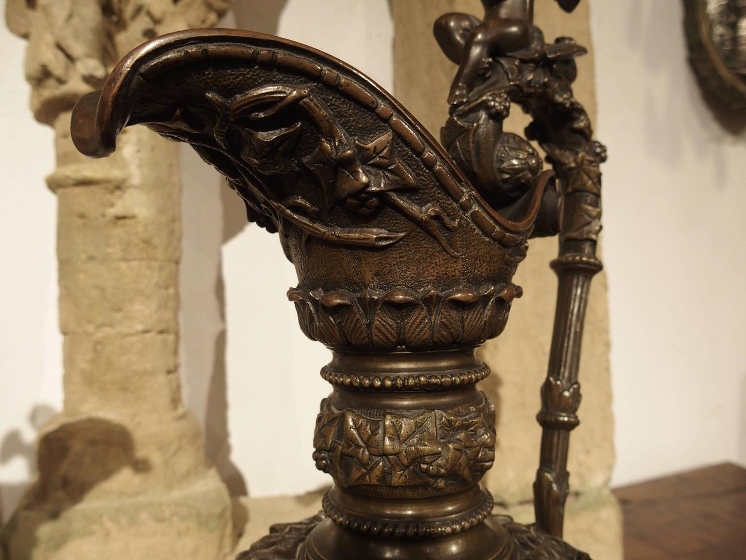 A Pair of Antique French Patinated Bronze Ewers with Bacchanalian ...