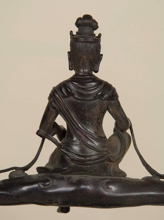 Japanese Bronze of the Goddess Kannon Seated on Clouds in a Zen Circle ...