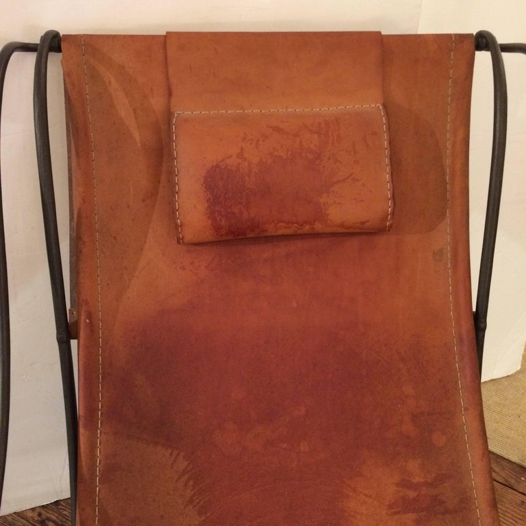Super Cool Sling Back Distressed Leather and Iron Rocking Chair at 1stDibs