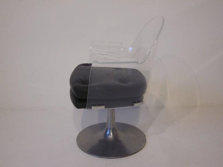 Tulip Based Lucite Upholstered Swiveling Armchair in the style of ...