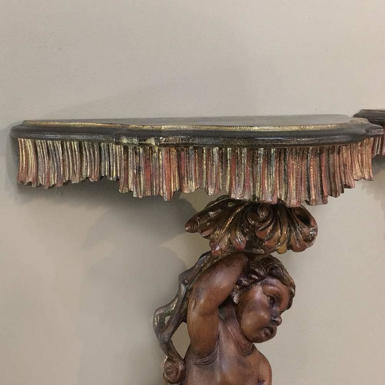 Pair of 19th Century Italian Hand-Carved Cherub Consoles at 1stDibs