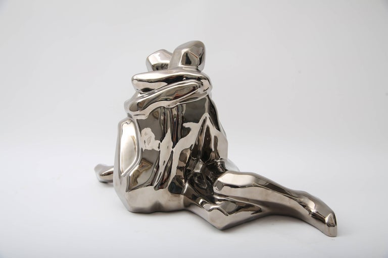 Jaru Figural Sculpture in Platinum at 1stDibs